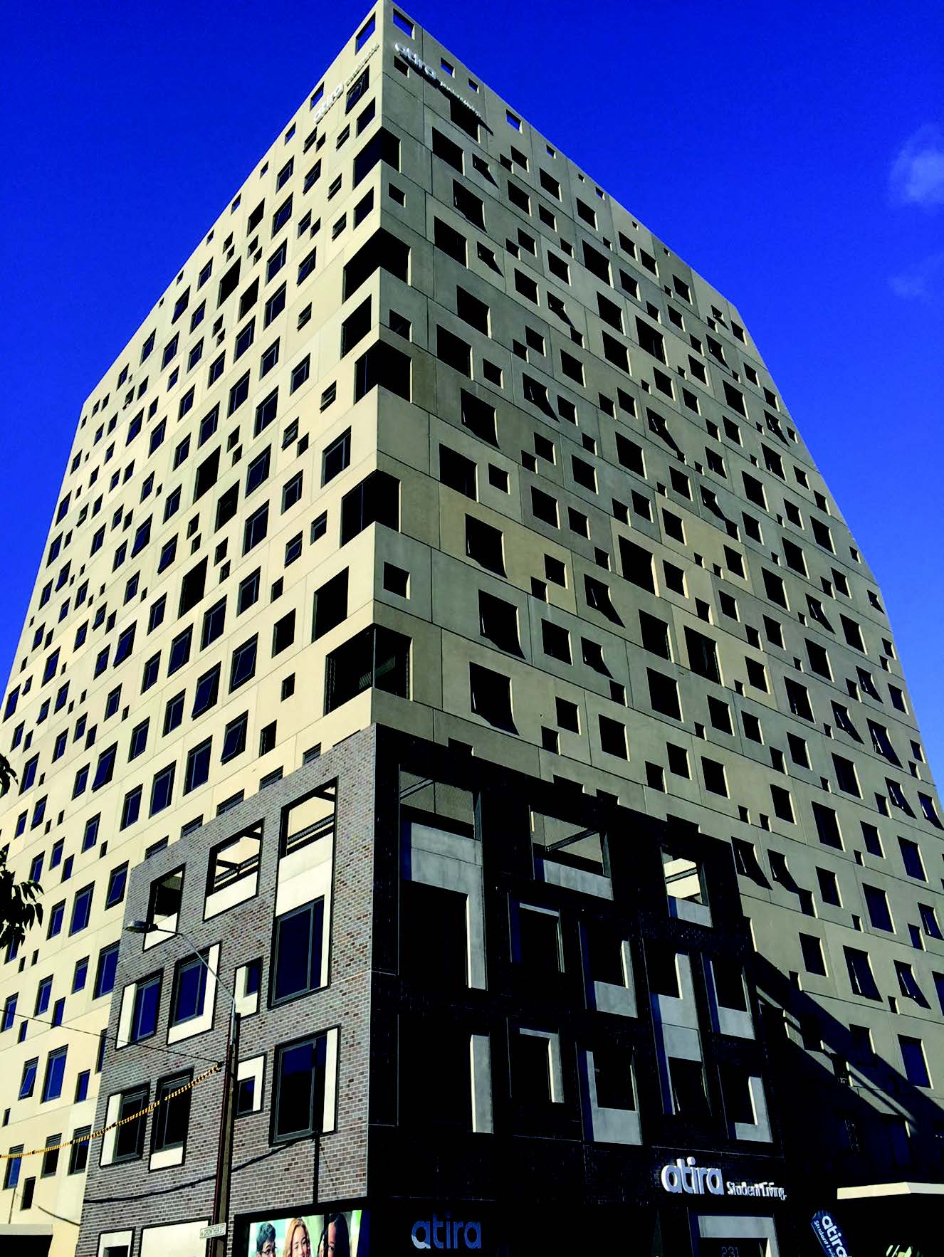 Looking Up at Large Blue Sky Complex Building